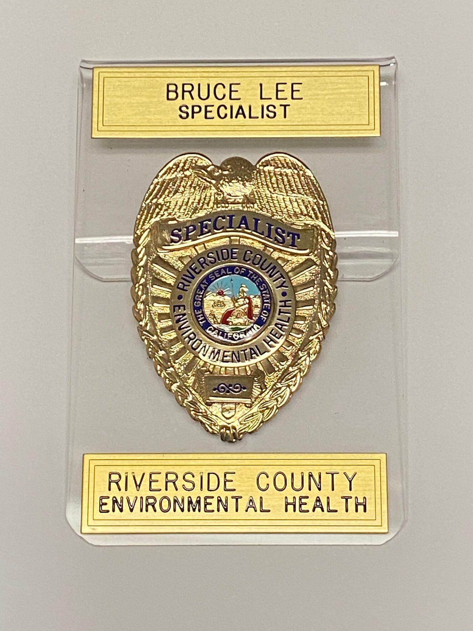 RIVERSIDE COUNTY HEALTH BADGE, PID FOLDED, AND HAS TWO PLATES - ER Badge RIVERSIDE COUNTY HEALTH BADGE, PID FOLDED, AND HAS TWO PLATES - ER Badge